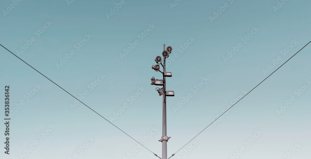 Street light pole in spiral with metal wire supporting , blue ...