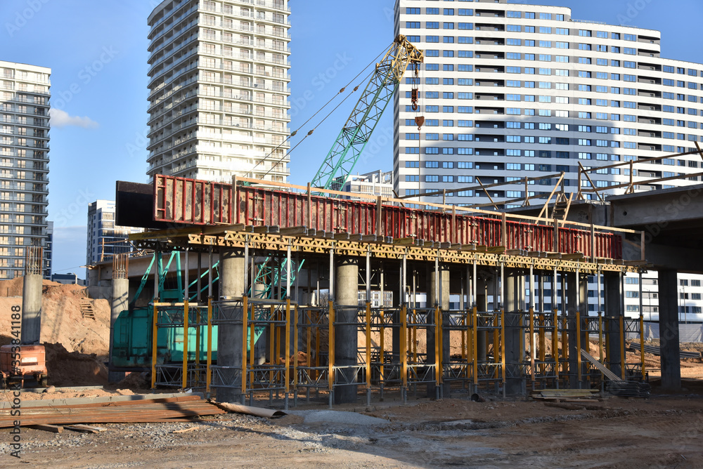 Roundabout and traffic bridge construction. Construction highway ramps ...