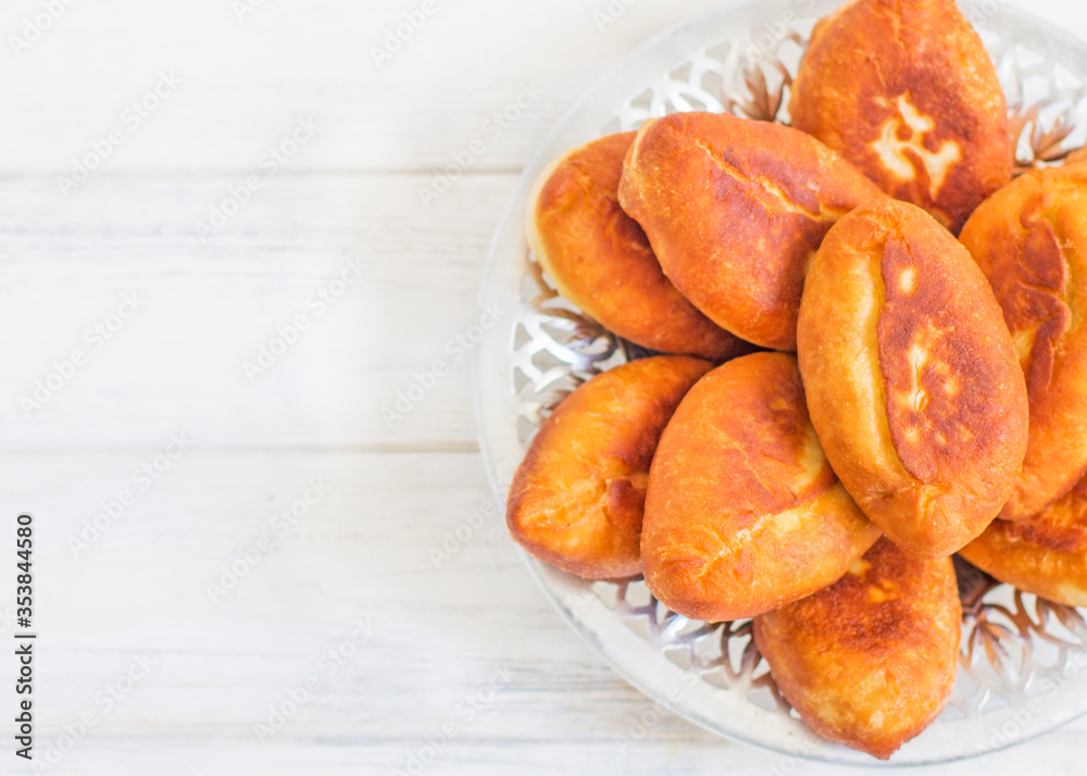 Piroshki - russian baked puff pastry with cabbage fillings. Traditional ...