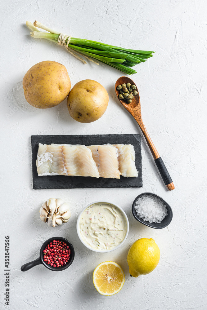 Traditional fish and chips ingredients recipe raw cod fillets on stone ...
