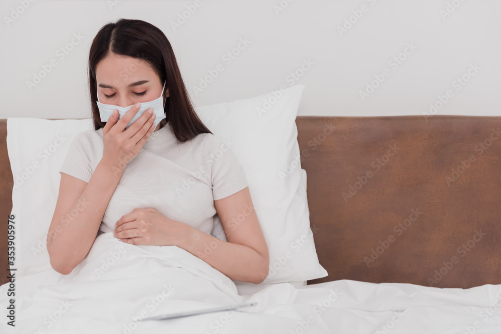 Asian women wearing medical masks that are sick, coughing, use their ...