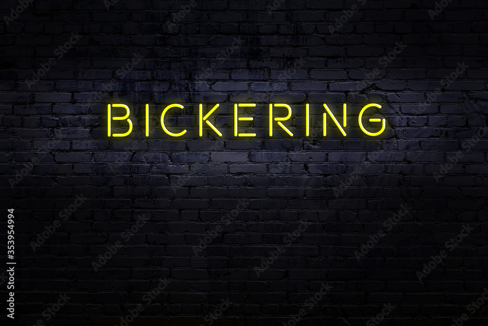 Neon sign. Word bickering against brick wall. Night view Stock ...