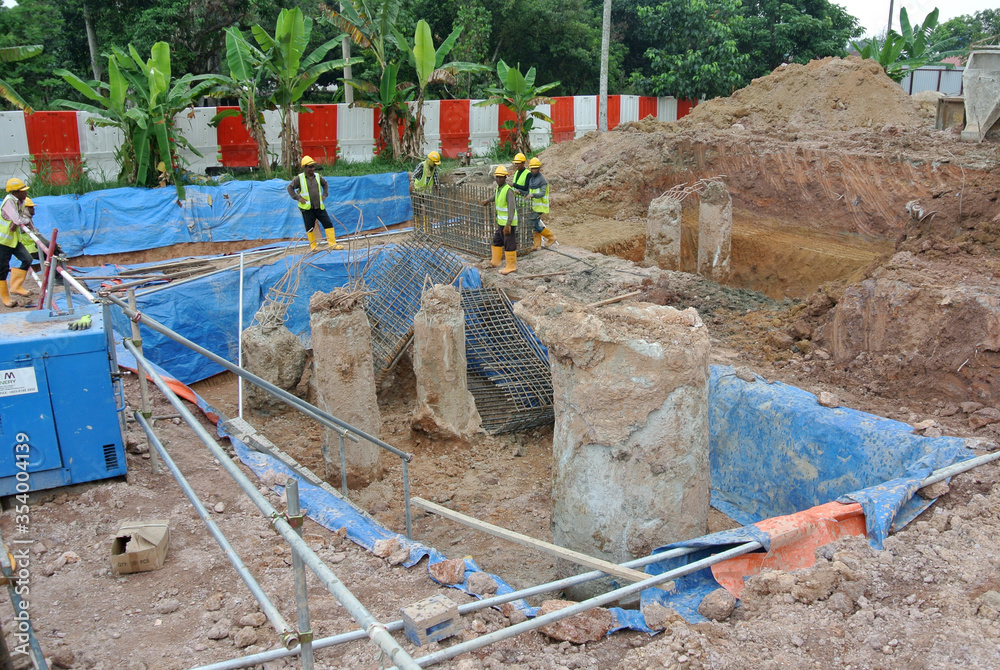 JOHOR, MALAYSIA -MARCH 28, 2016: Excavated and cut to level bore pile ...