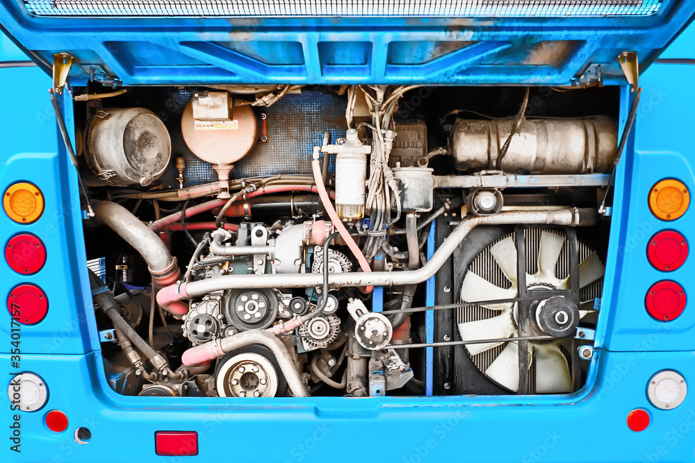 Foto de bus engine compartment open for repair. Back side close up view ...