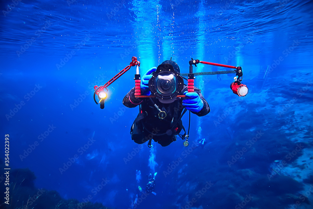 underwater photographer with a camera, diver hobby special underwater ...