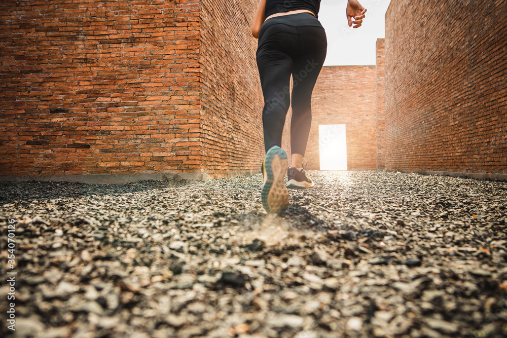 The woman with runner on the street be running for exercise. Sport ...