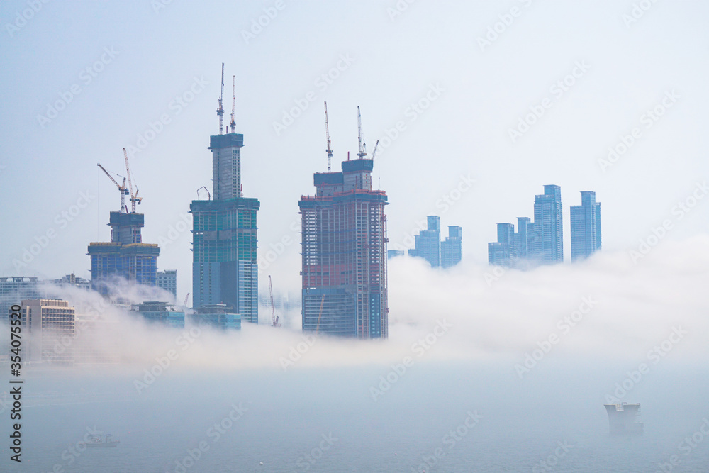 Thick large and heavy mist blow from the sea to the land and pass ...