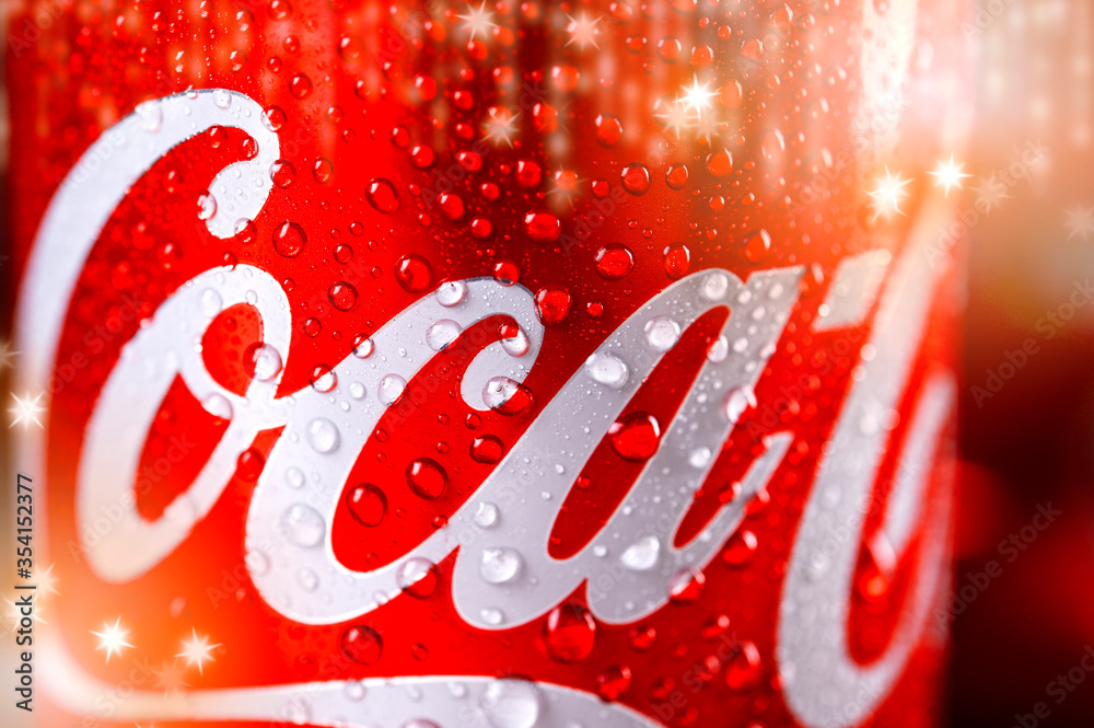 A can, tin of fresh Coca Cola drink with brick wall backround. Coca ...