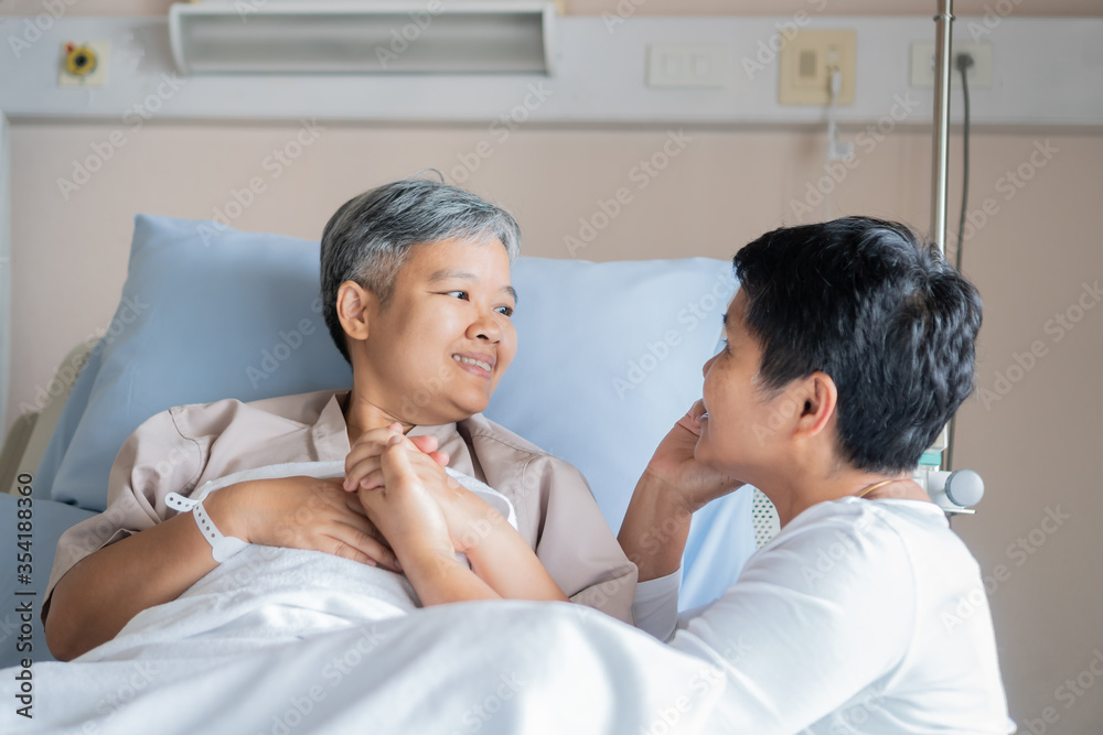 Love hope concept: Happy Daughter Visits mother holding hand for ...