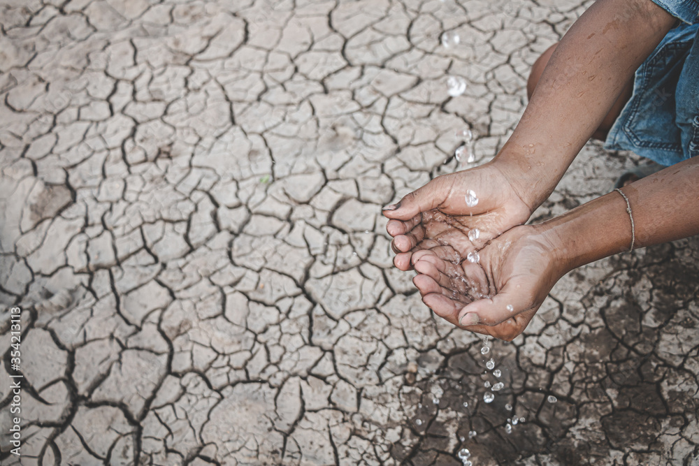 The little boy waiting for drinking water to live through this drought ...