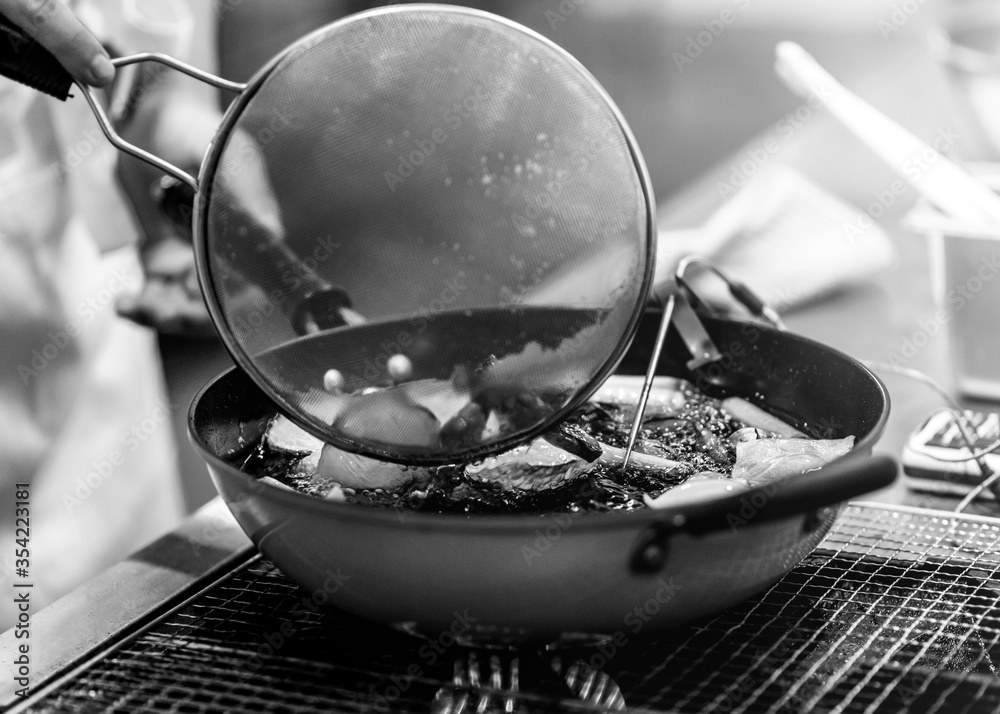 Chef cooking in a kitchen, chef at work, Black & White. Stock Photo ...