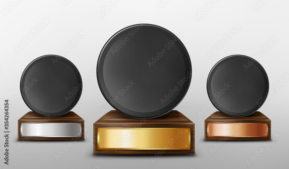Realistic 3d vector illustration of trophy cups. Black pucks on wooden ...
