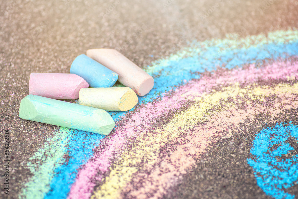 Foto de Sidewalk chalks close-up. rainbow chalk painting. Summer ...