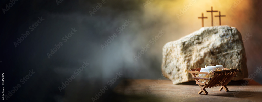 Wooden manger, three crosses background. Jesus - reason for season ...