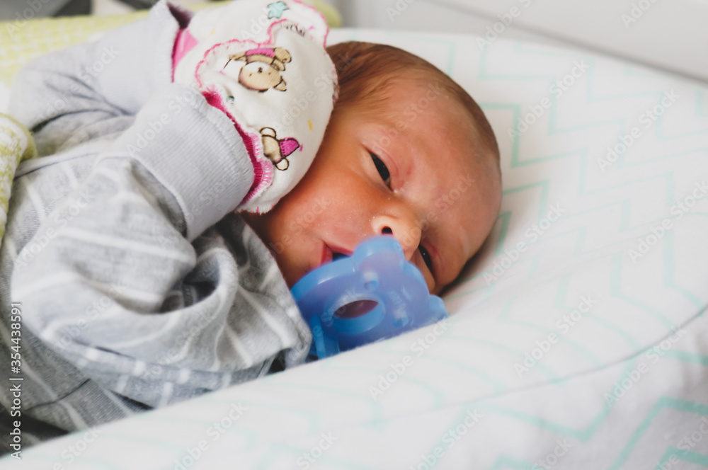 ten day beautiful infant girl sleeping peacefully with a pacifier Stock ...
