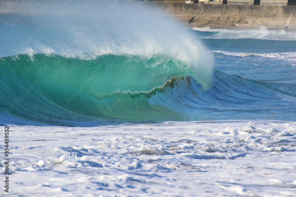 Waves breaking in Japan. The Pacific Ocean & its waves often generated ...