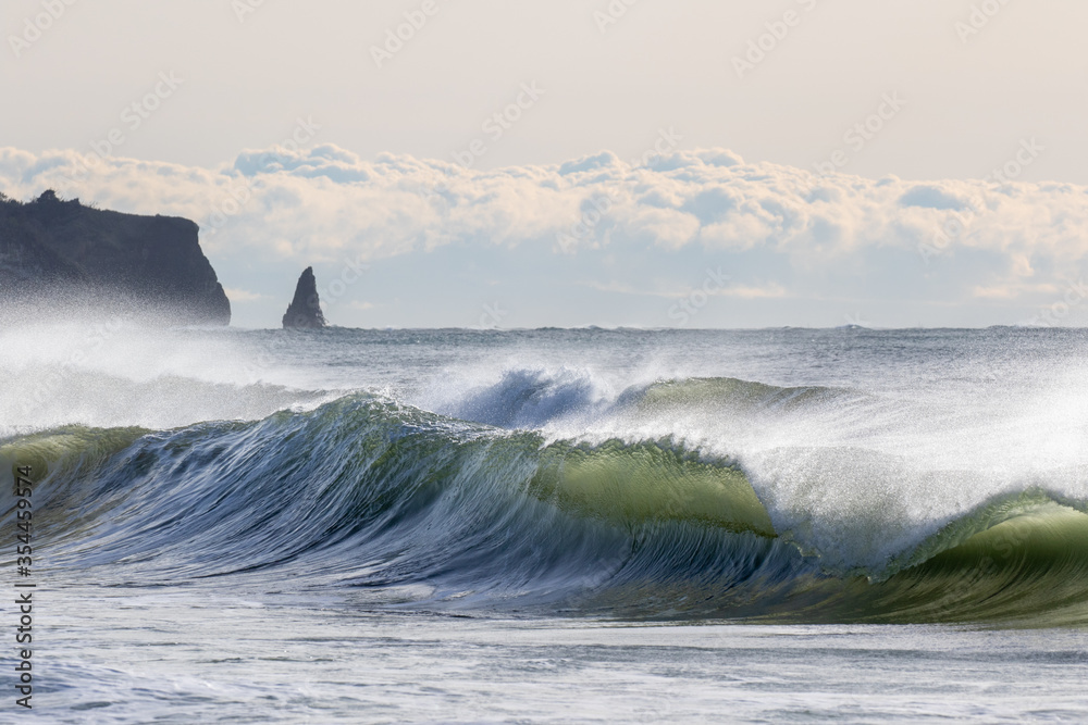 Waves breaking in Japan. The Pacific Ocean & its waves often generated ...
