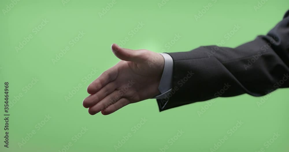 Businessman handshake on green screen. Show in 4k slow-motion ...