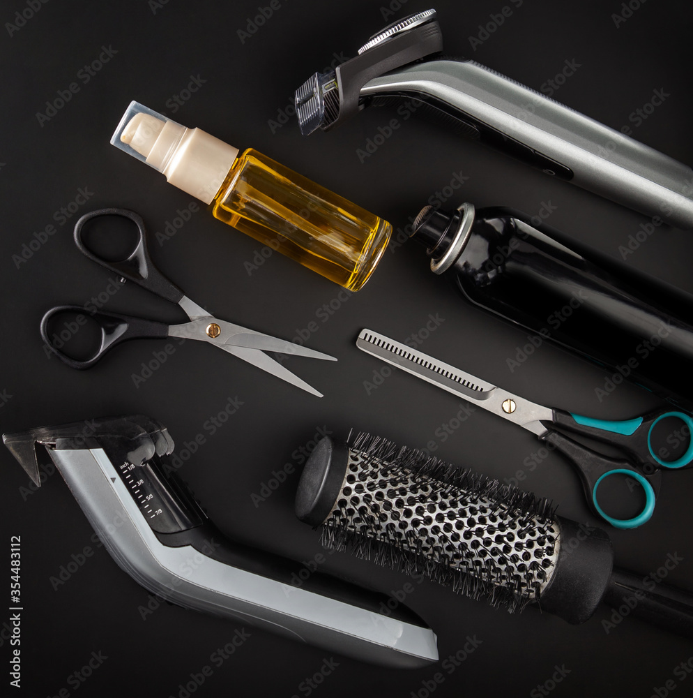 set of tools. top view. barbershop tools on a black background for ...