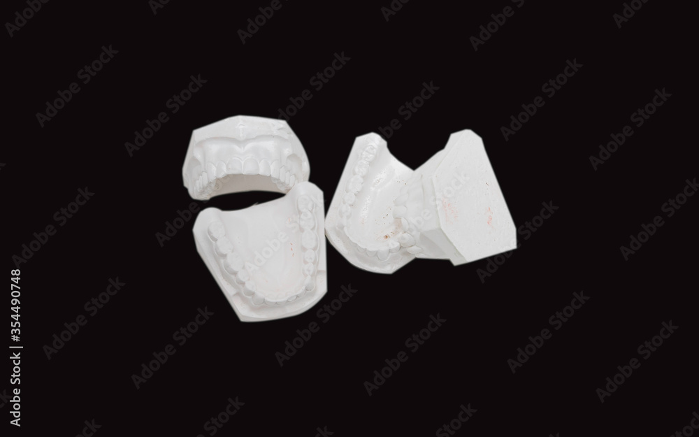 Blurry image,teeth model Is a tooth block made of cement For use in ...