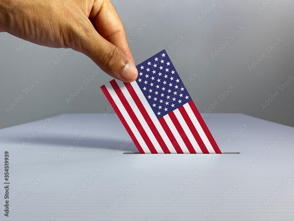 Voting / election concept: hand holding voting card with country ...