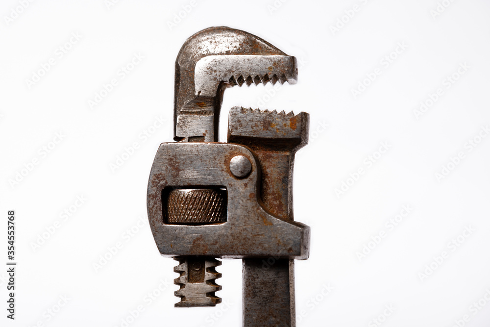 Llave grifa vieja y oxidada sobre fondo blanco Stock Photo | Adobe Stock