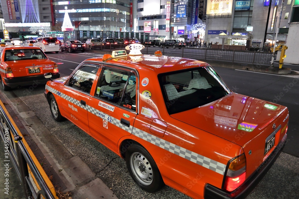TOKYO, JAPAN - NOVEMBER 29, 2016: Taxi cab atTokyo city Ikebukuro ...