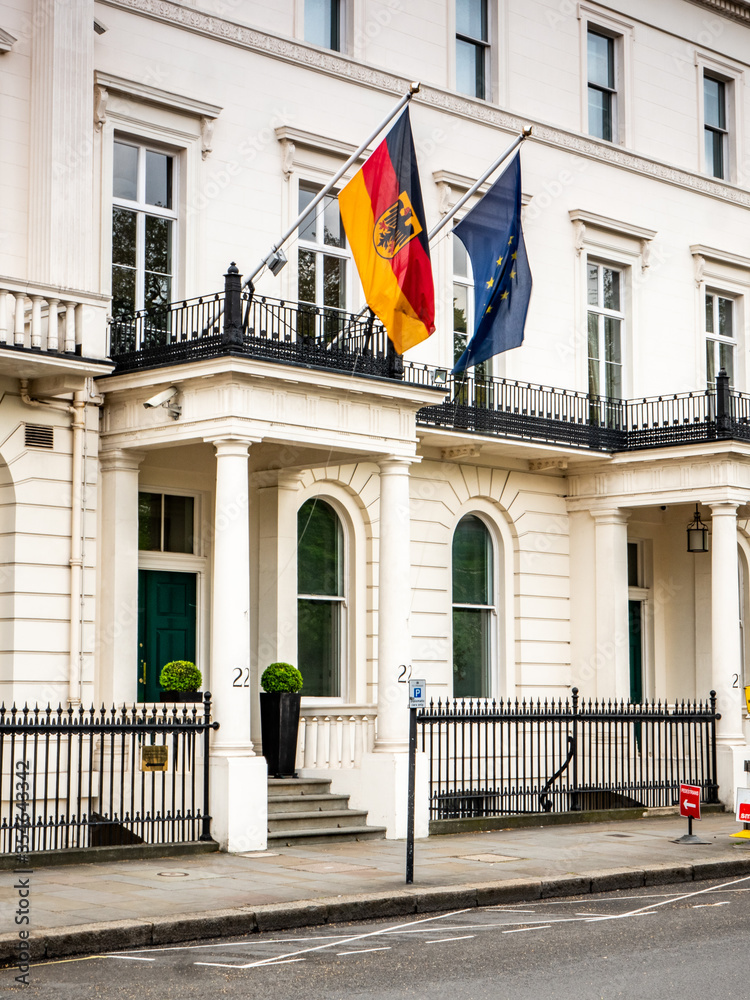 Embassy of Germany, London, UK. The German and EU flags flying over an ...