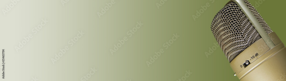 condenser microphone in a gradient background with free space on the ...