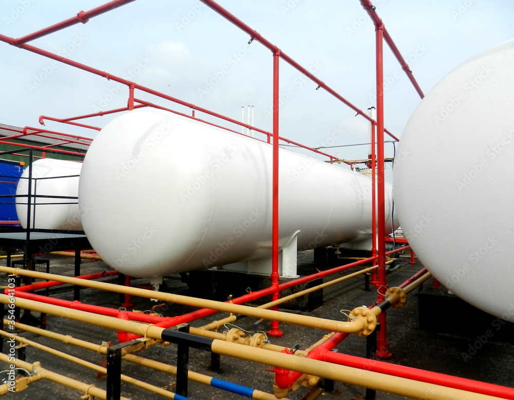 Large gas pressure tanks and pipes in gas compound Stock Photo | Adobe ...
