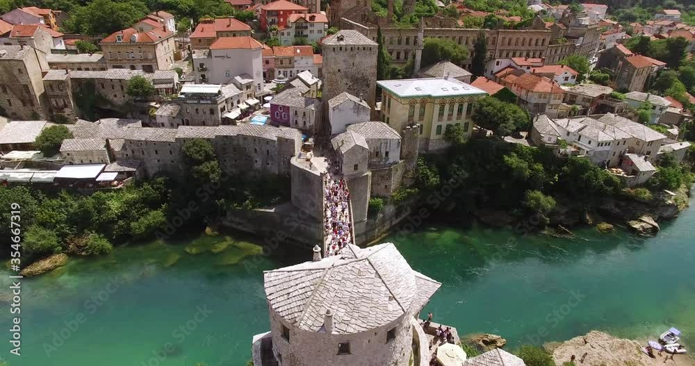 An aerial view shows crowds assembled on the Mostar Bridge and the ...