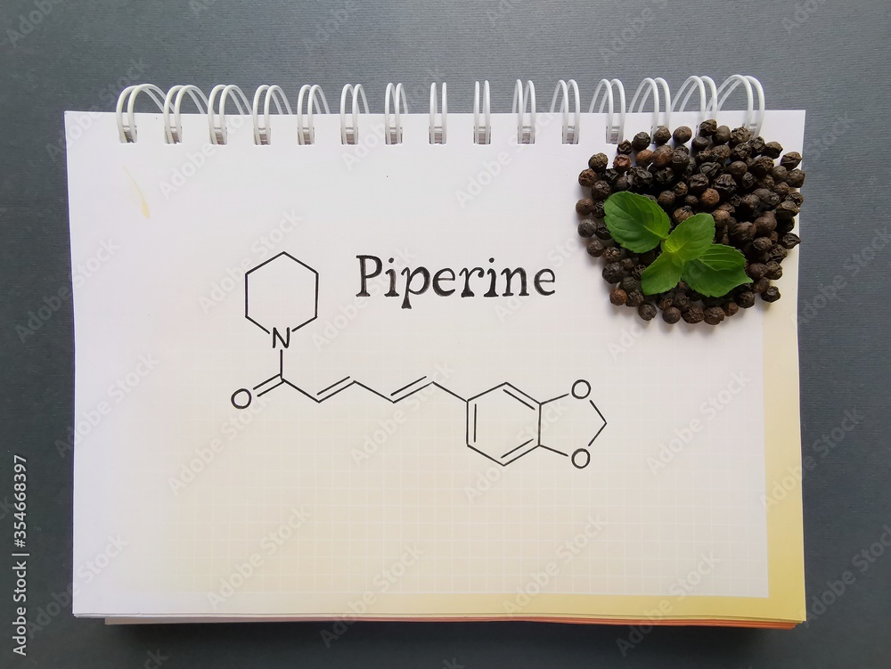 Structural chemical formula of piperine molecule with black pepper ...