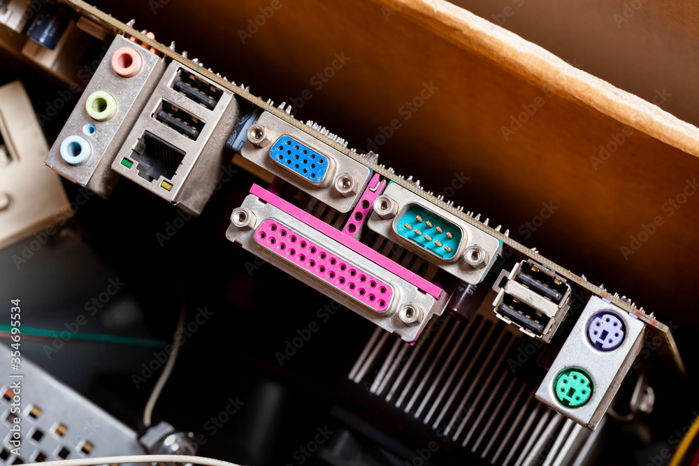 Old dated motherboard back side closeup, ports input/output, VGA ...