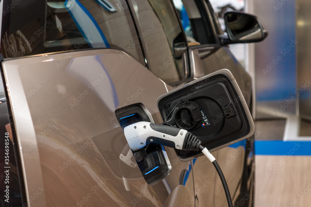 Foto de BERLIN - NOVEMBER 07, 2013: Showroom. Electric plug (electric ...