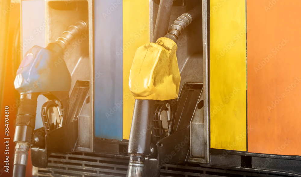 Fuel dispenser or fuel injector blue and yellow gas pump petrol station ...