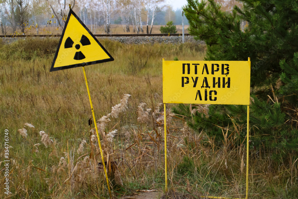 Fotka „Yellow radiation warning signs in Russian language and Cyrillic ...
