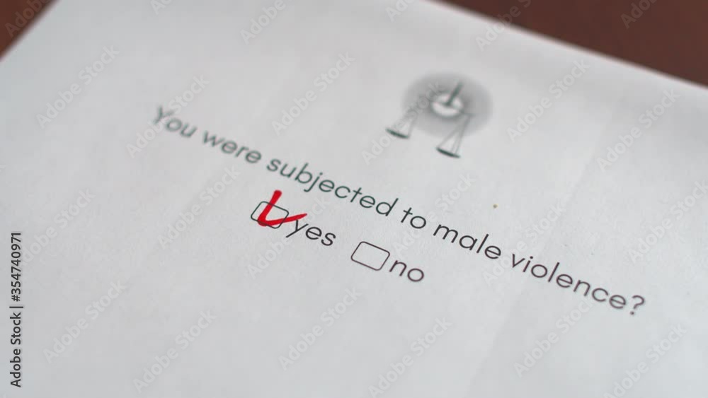 Close-up of the marker that puts a check mark in the test. The hand ...