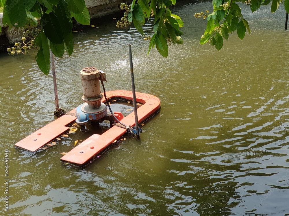 Mechanical compressed air and water suction aerator installed in public ...