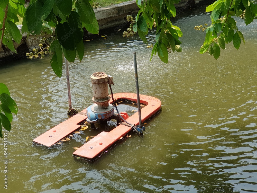 Mechanical compressed air and water suction aerator installed in public ...