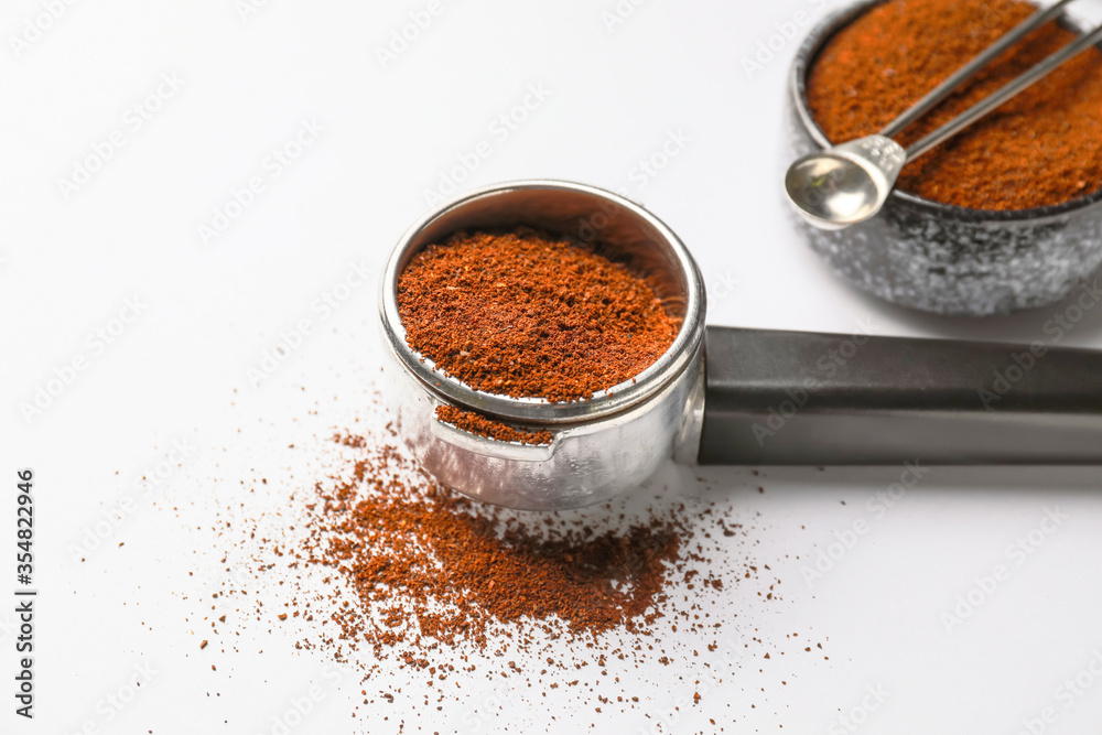 Scoop with coffee powder on white background Stock Photo | Adobe Stock