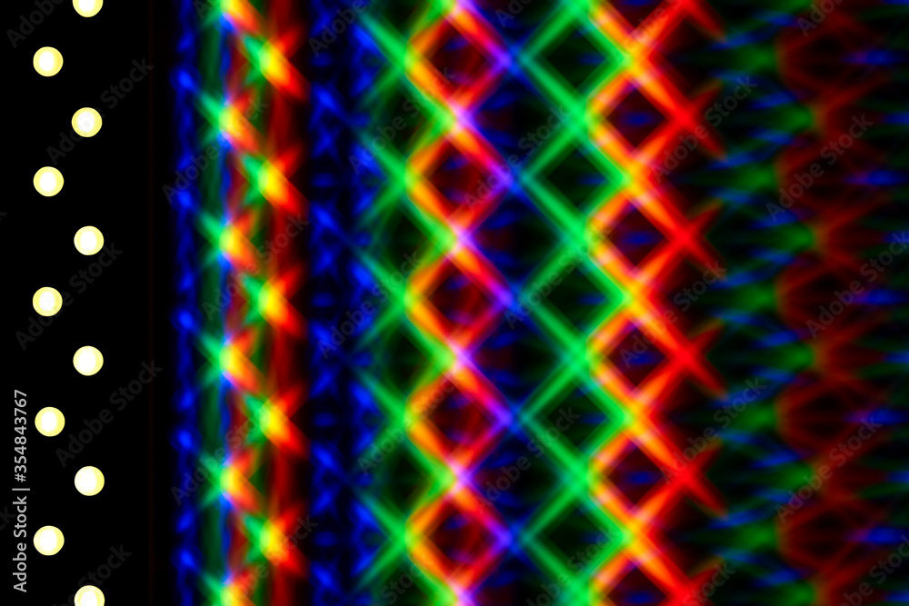Photo of a diffraction pattern from a line of LEDs. Image was obtained ...