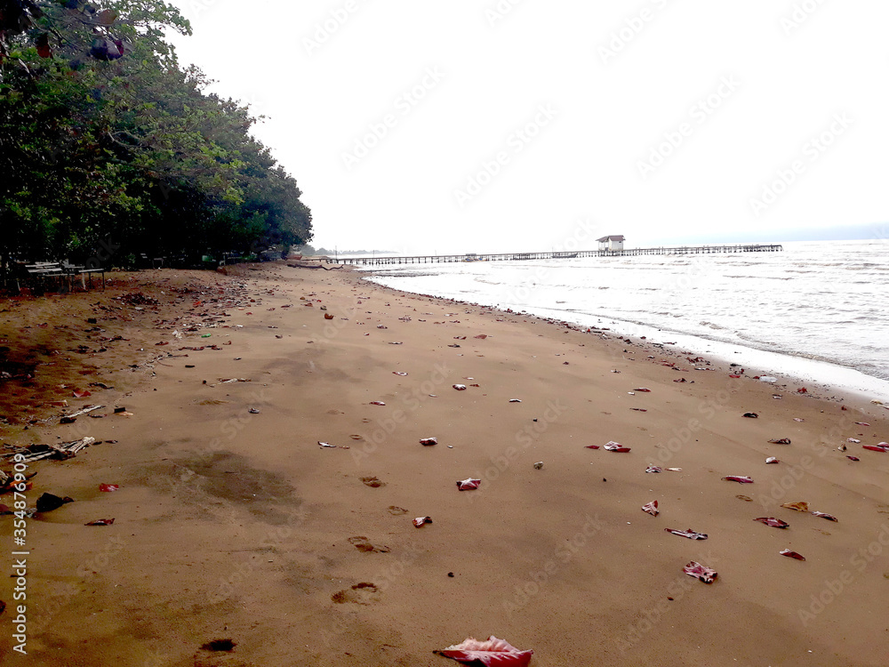 a beach scene in the afternoon which is located in West Kalimantan ...