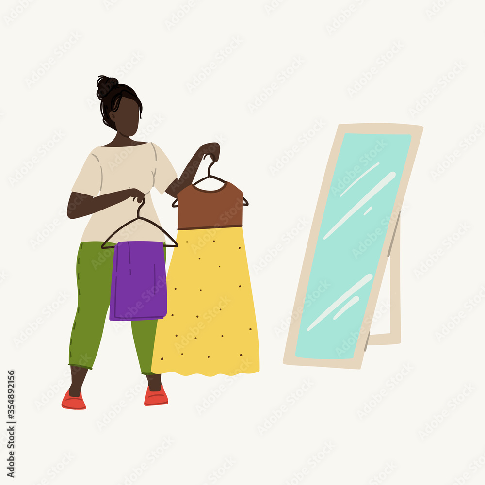 Afro-american woman try cloth on swap party or in clothing store ...