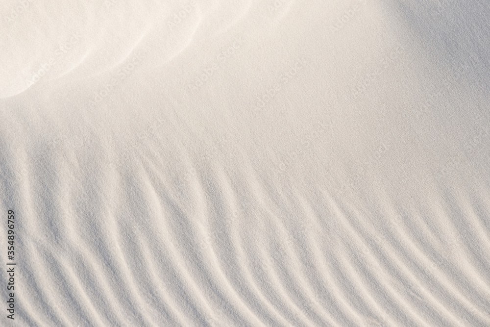 Light patterns on the sand of dune. Sand texture. Sandy beach for the ...
