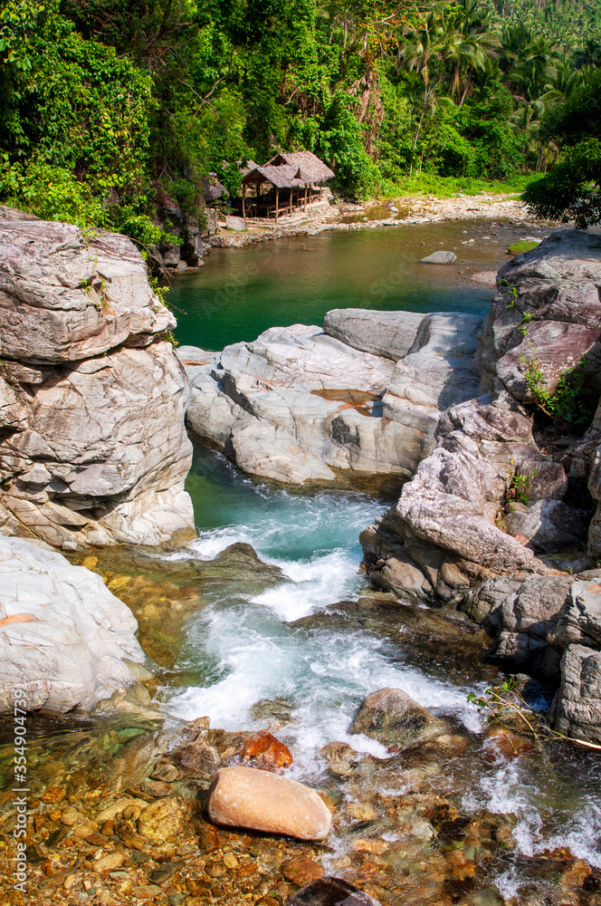 Amazing river with smooth rocks and series of waterfalls in the ...