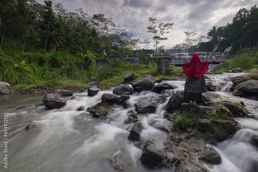 (Grojogan Watu Purbo) Watu Purbo waterfall is a multi-storey river dam ...