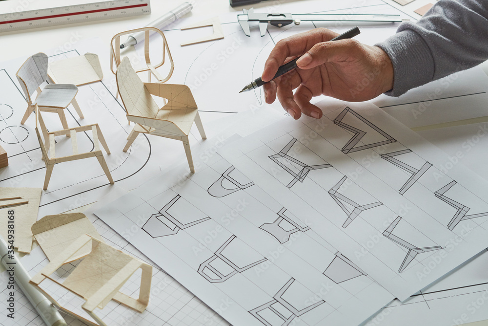 Designer sketching drawing design development product plan draft chair ...