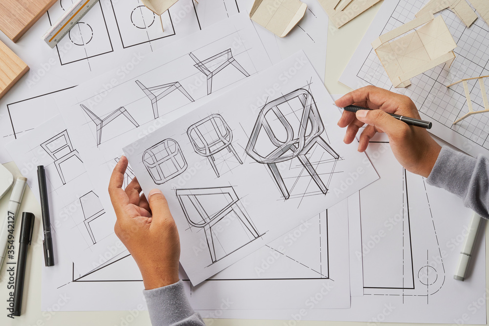 Designer sketching drawing design development product plan draft chair ...