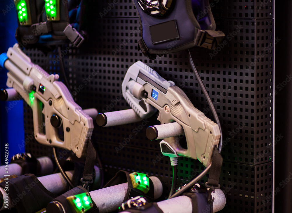 Foto de laser tag gun and armor. A variety of weapons for playing laser ...