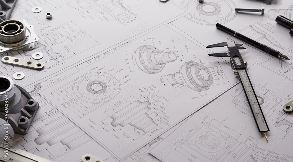 Engineer technician designing drawings mechanical parts engineering ...
